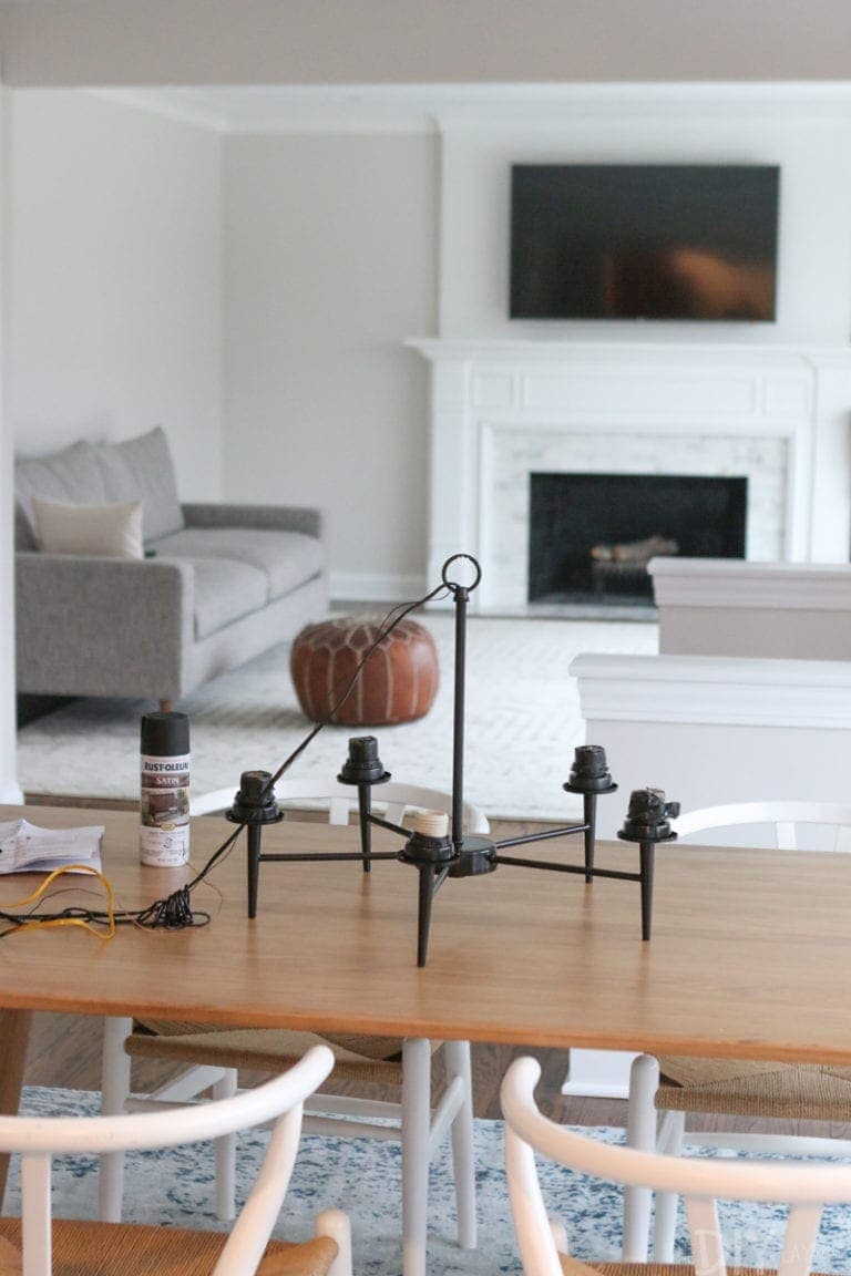 Spray Painting a Light Fixture Black For The Dining Room